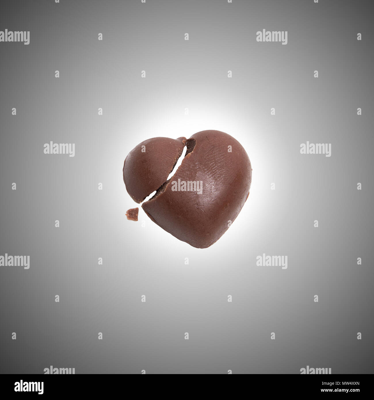 Broken Chocolate heart candy Stock Photo - Alamy