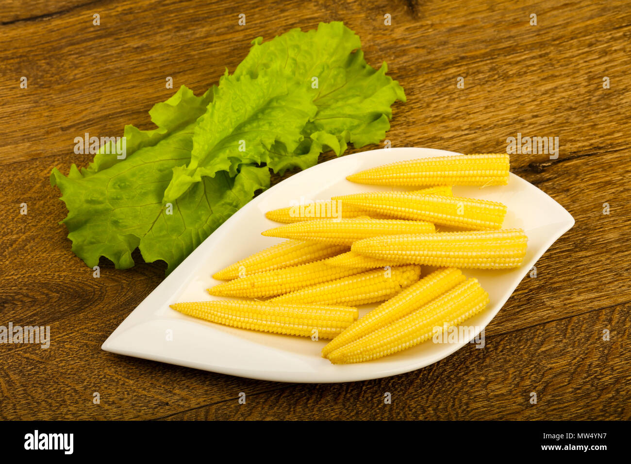 Young raw baby corn Stock Photo - Alamy