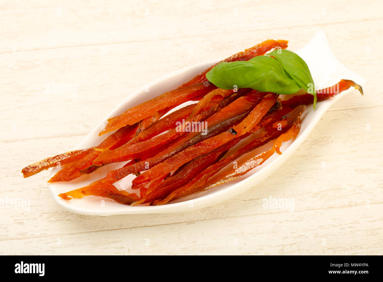 Salmon dry sticks snack Stock Photo - Alamy