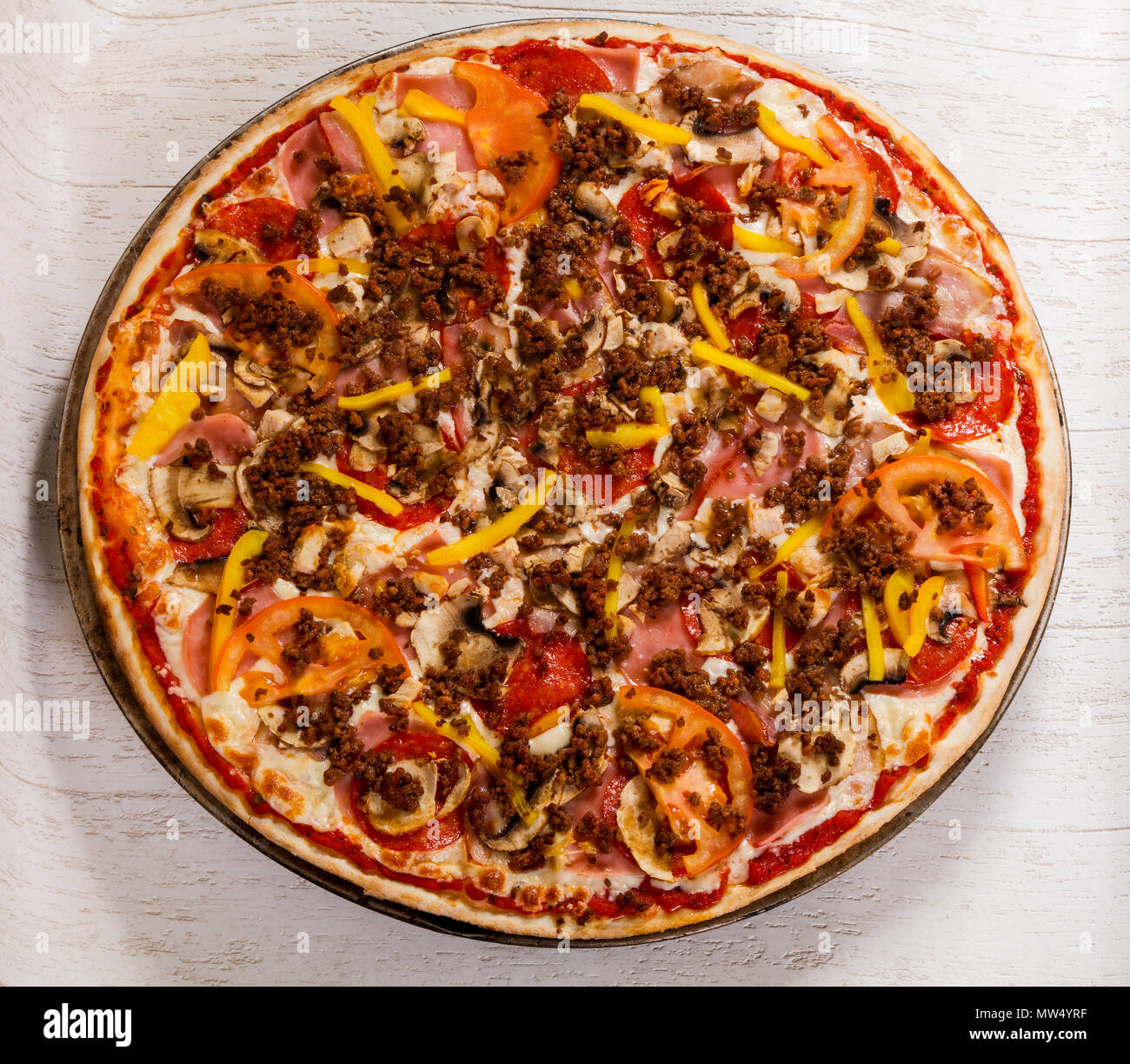 Pizza with minced meat and vegetables Stock Photo - Alamy