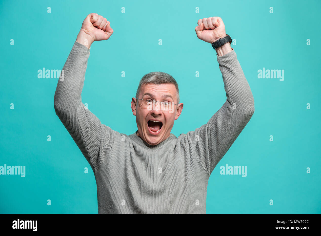 Winning success man happy ecstatic celebrating being a winner. Dynamic ...