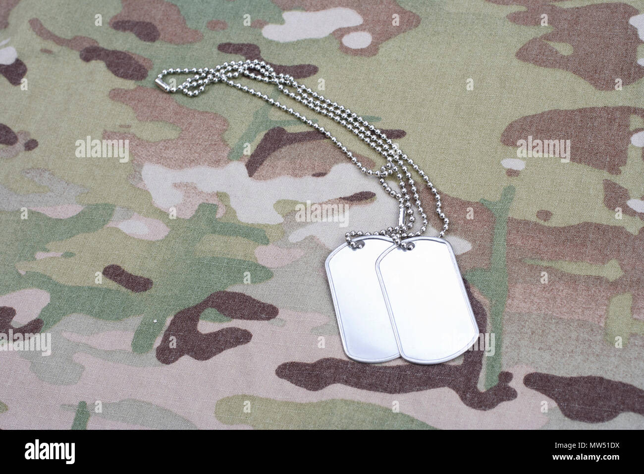 dog tag on multicam camouflage uniform Stock Photo - Alamy