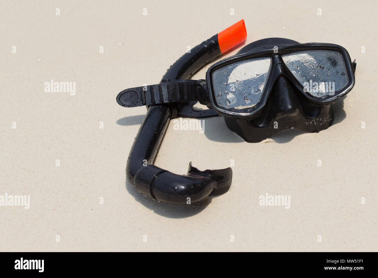 Diving mask and snorkel on the beach Stock Photo - Alamy