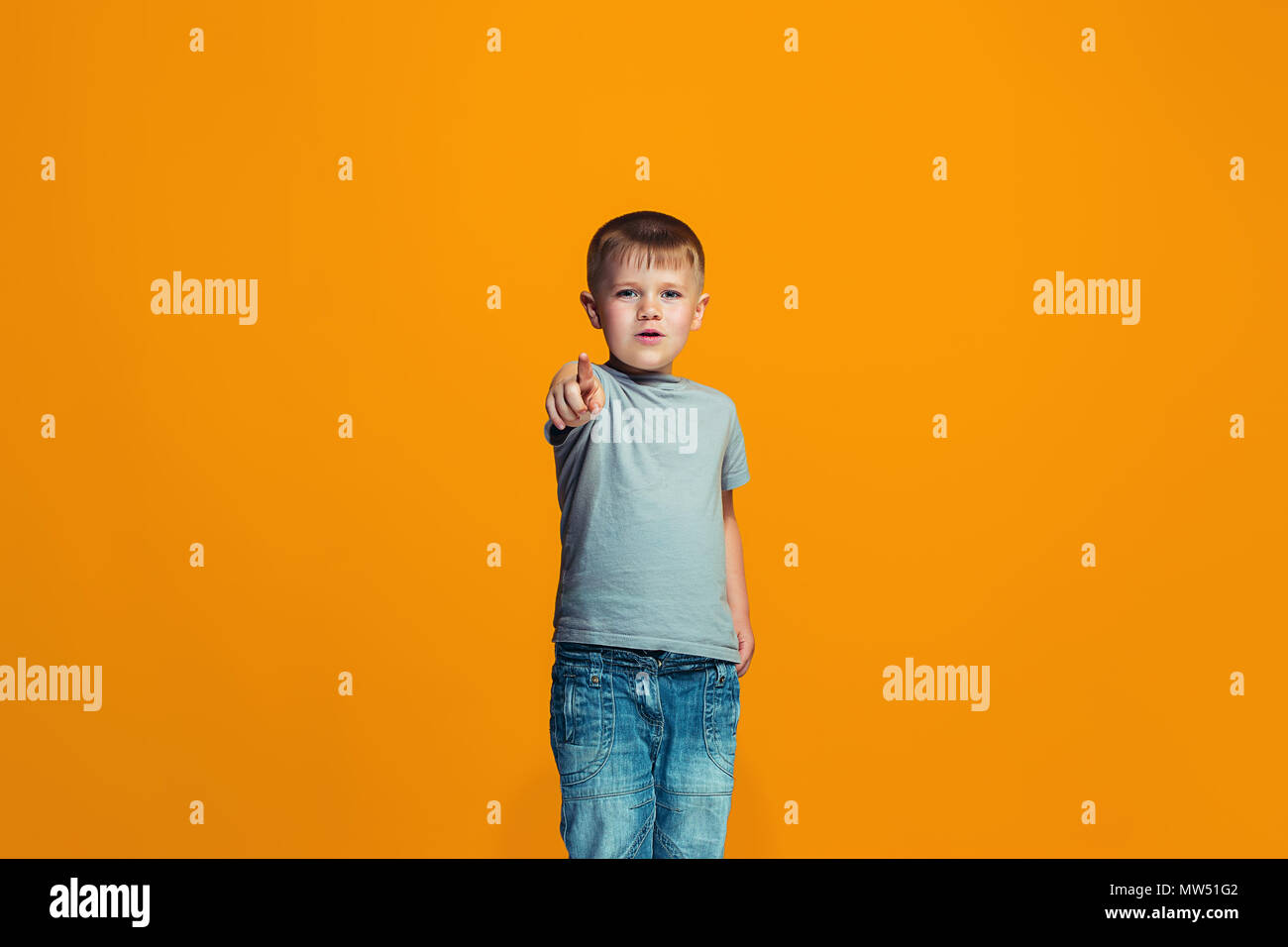 Teen boy pointing hi-res stock photography and images - Alamy
