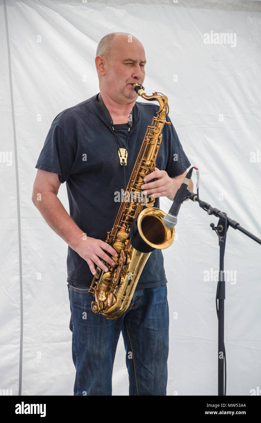 Man playing tenor saxophone hi-res stock photography and images - Alamy