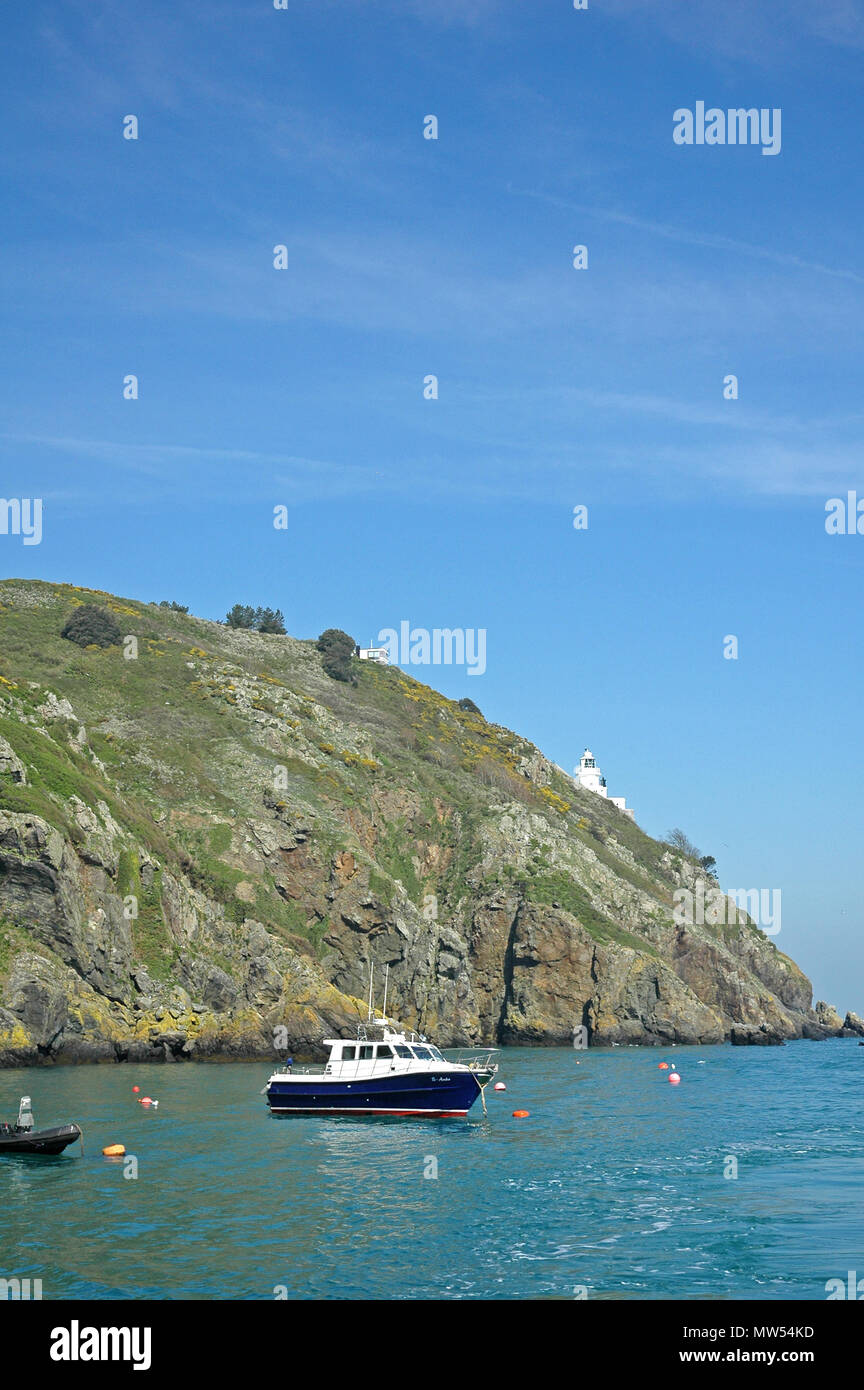 Launch at anchor past Point Robert Lighthouse near la Maseline Jetty ...