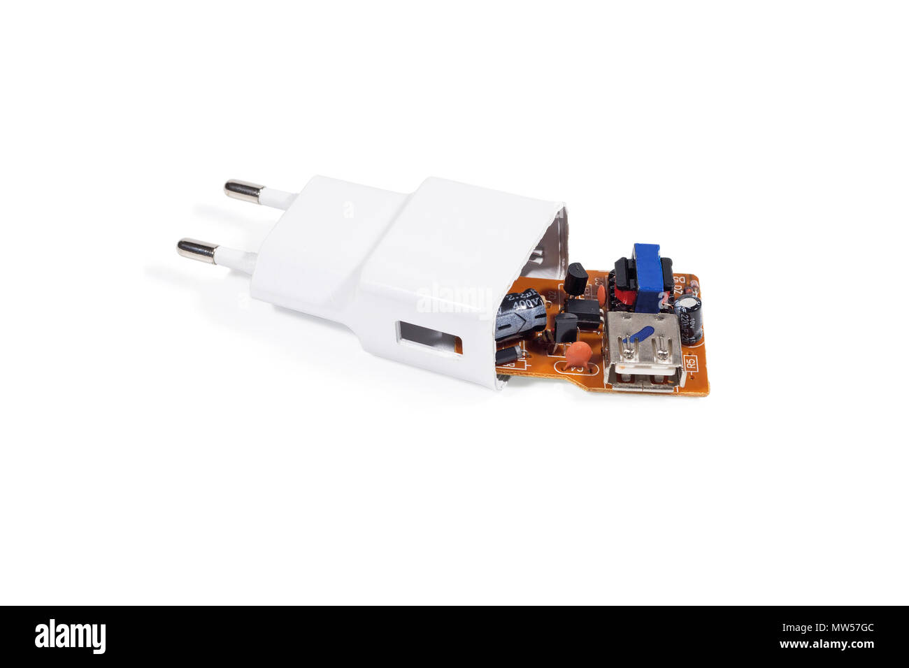 Broken charger in white color. Close-up. Isolated on white background ...