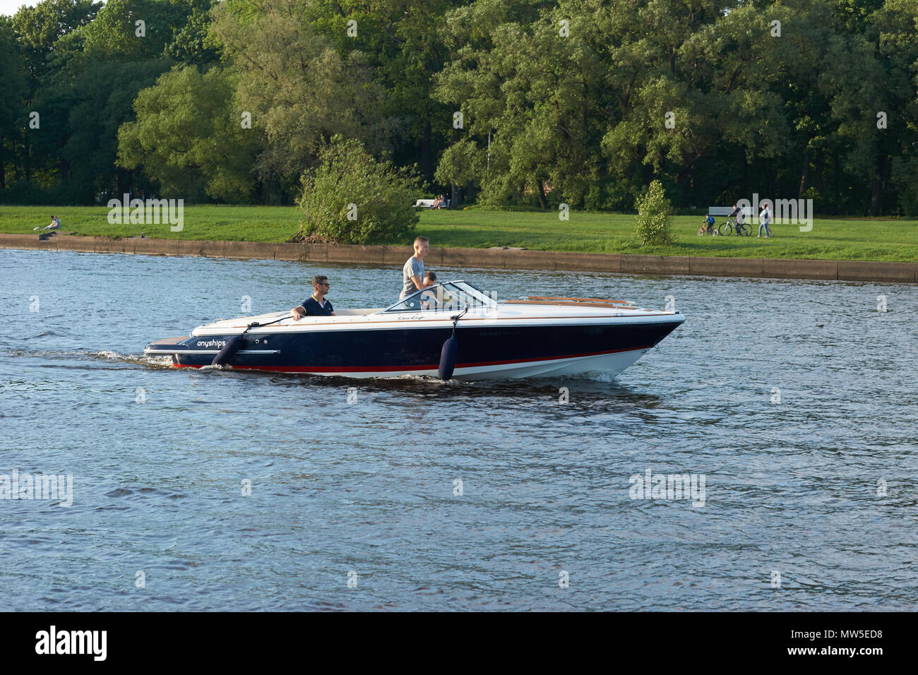 Motor boat on water Stock Photo - Alamy