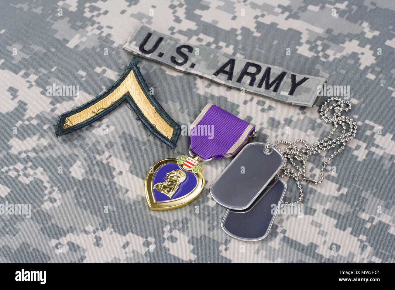 KIEV, UKRAINE - March 6, 2016. Purple Heart award on US ARMY camouflage ...
