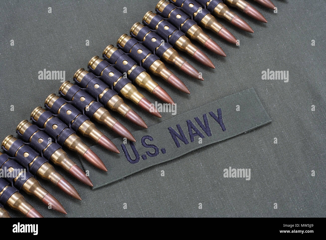 ammunition belt on US NAVY uniform background Stock Photo - Alamy