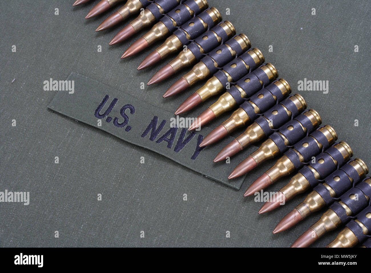 ammunition belt on US NAVY uniform background Stock Photo - Alamy