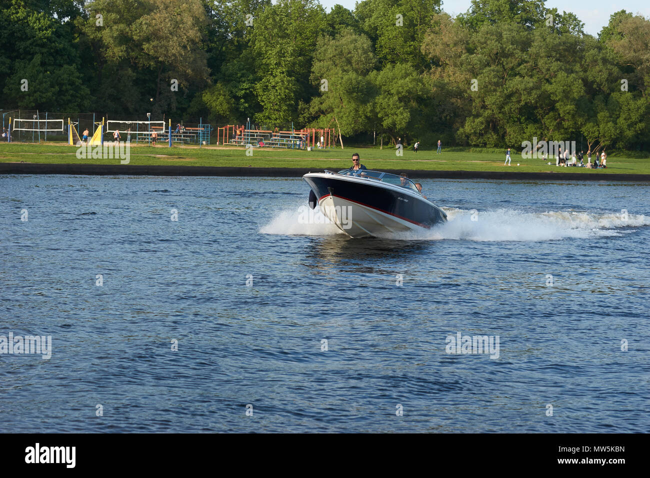 Motor boat on water Stock Photo - Alamy