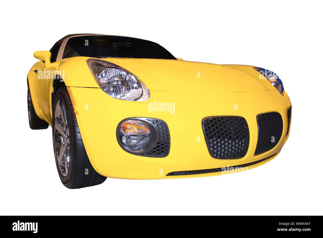 A yellow Pontiac Soltice convertible sports car. Isolated on a white ...