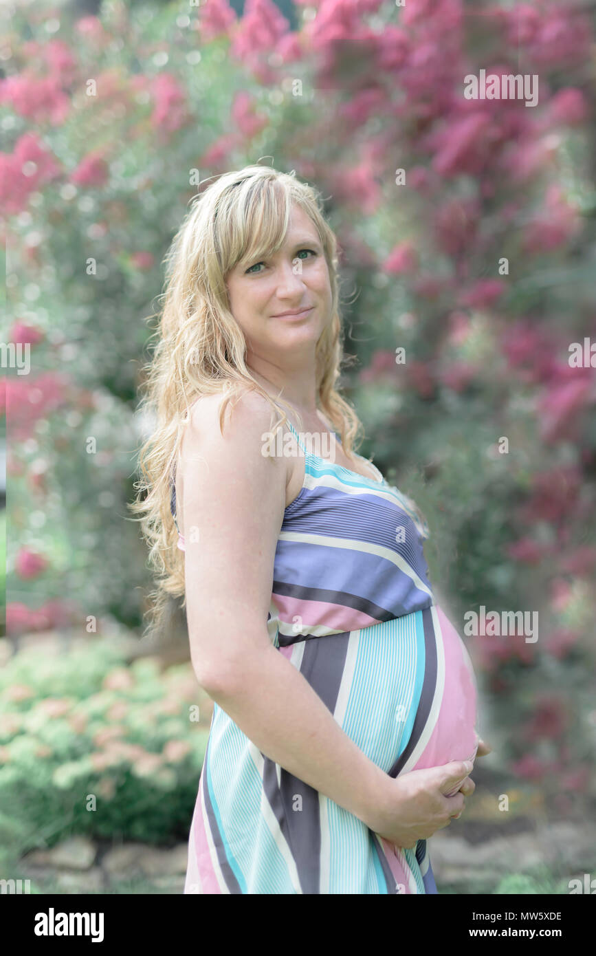 Portrait pretty pregnant woman flowers hi-res stock photography and ...