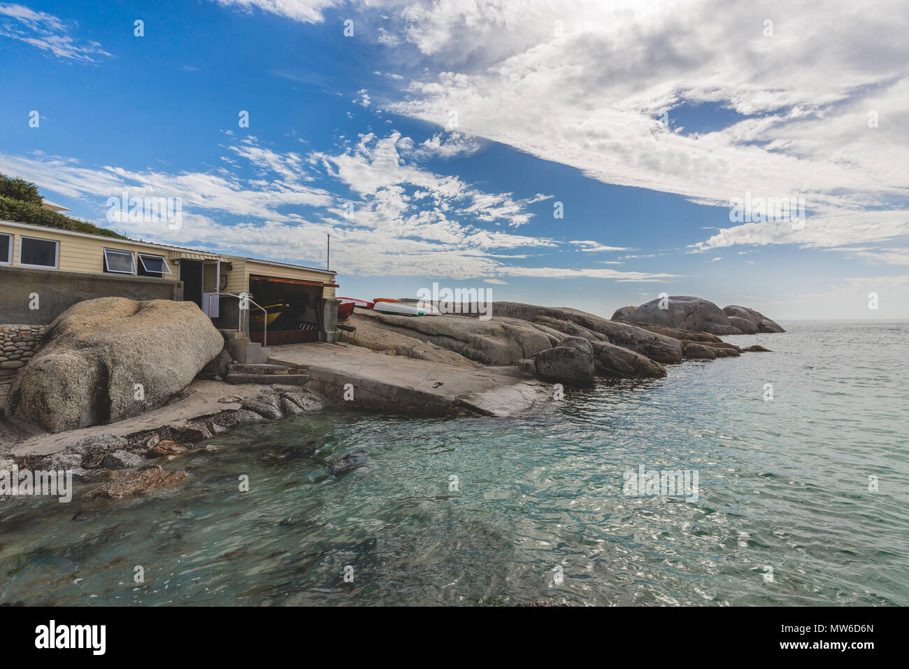 Boat yard in Cape Town with blue water and blue sky Stock Photo - Alamy