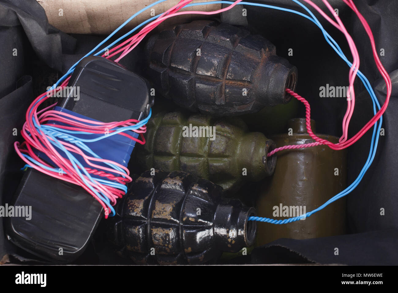 Mailbomb IED - Improvised Explosive Device in mailbox isolated on white ...