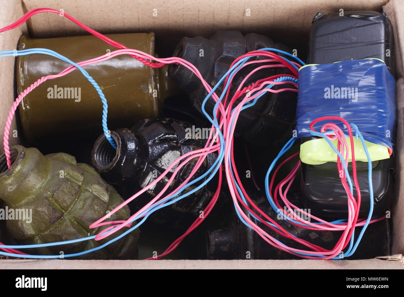 Mailbomb IED - Improvised Explosive Device in mailbox isolated on white ...