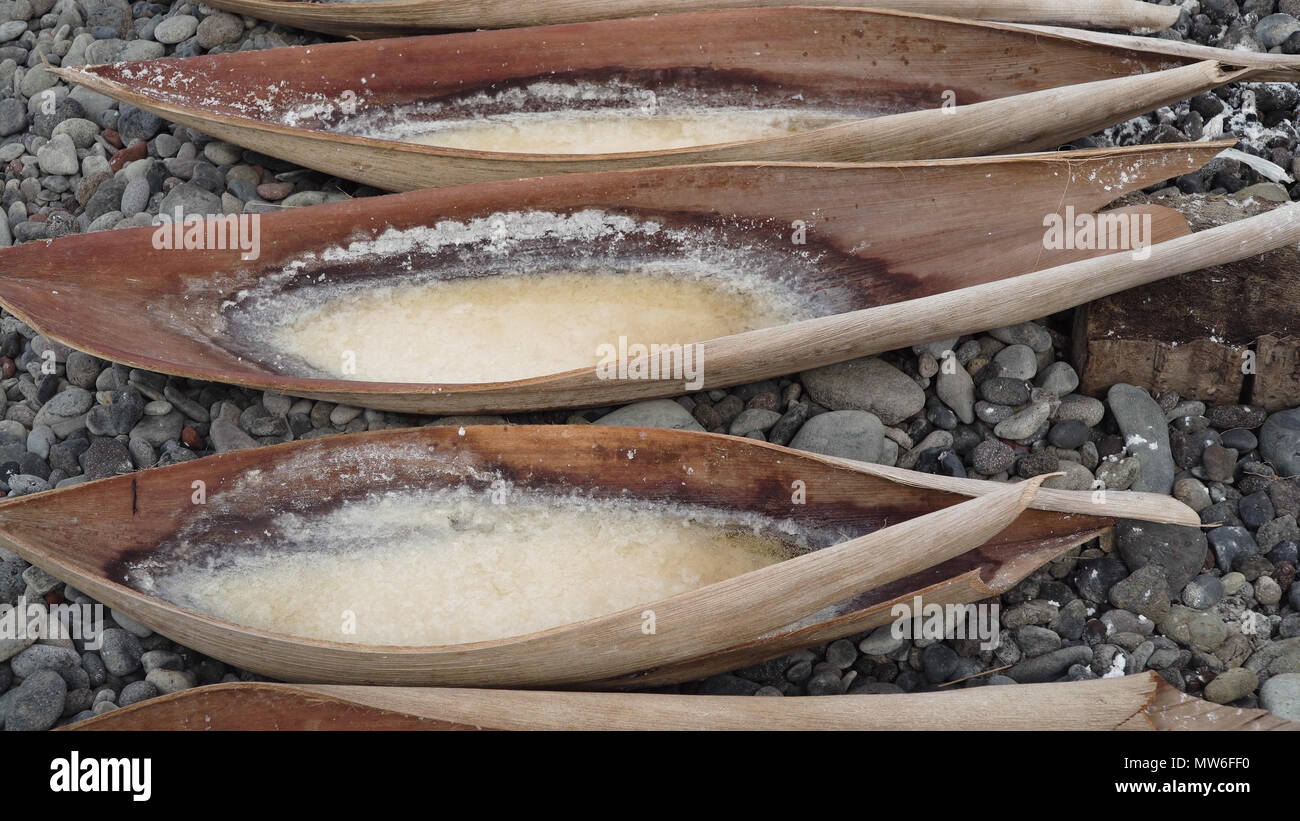 Production of sea salt in the Bali,Indonesia. Salt crystallizes out of ...