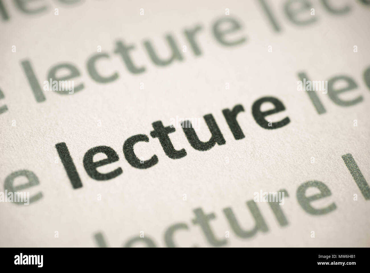 word lecture printed on white paper macro Stock Photo - Alamy