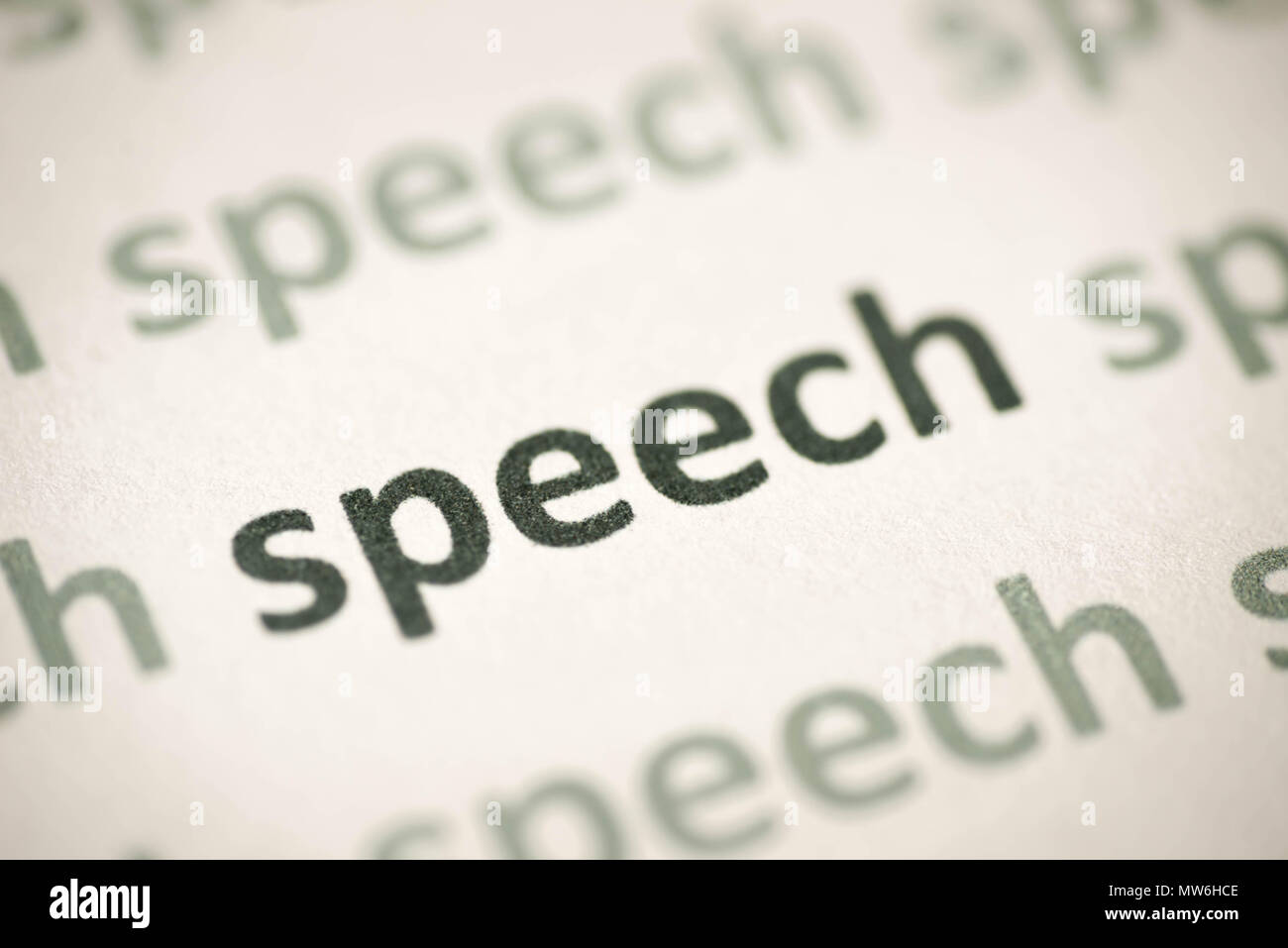 word speech printed on white paper macro Stock Photo - Alamy
