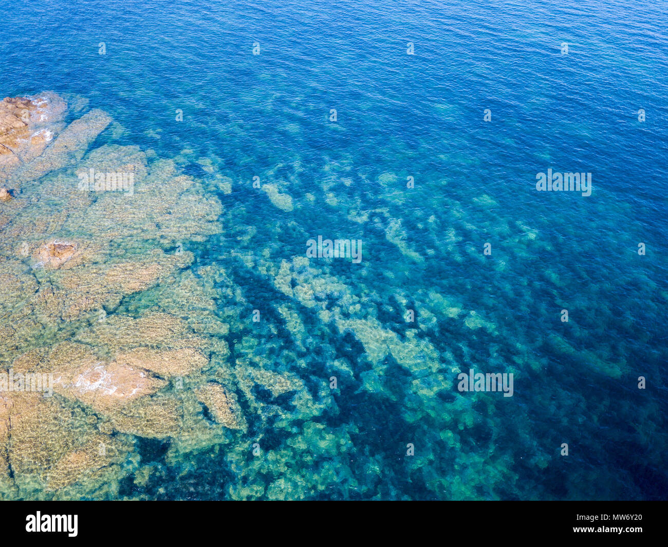 Aerial view of rocks on the sea. Overview of the seabed seen from above ...