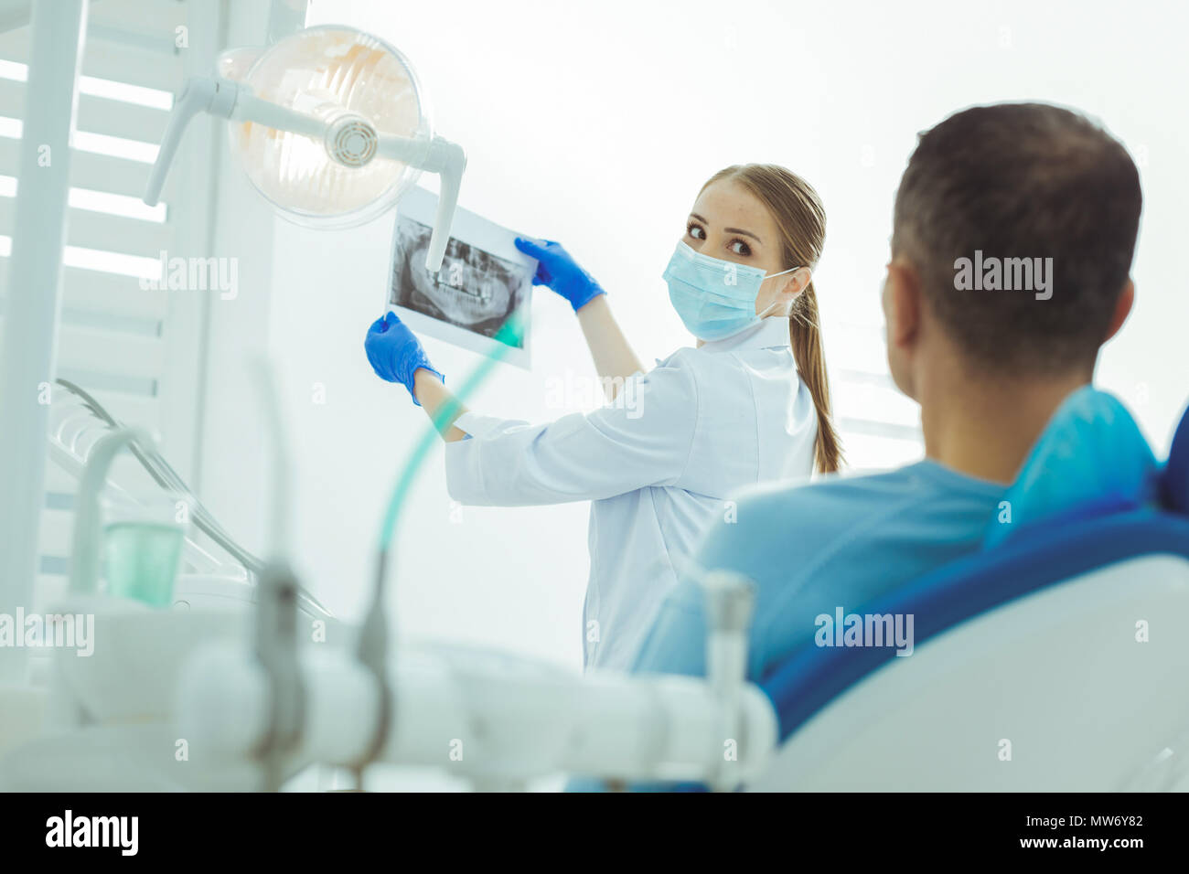 Beautiful female person analyzing roentgenogram Stock Photo - Alamy
