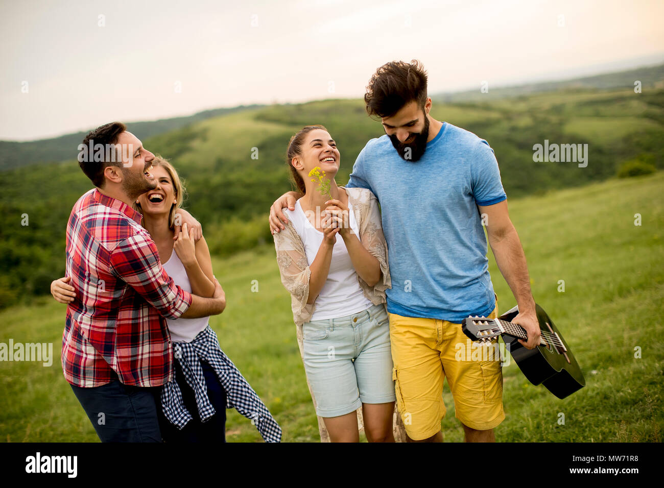 Group od young people having fun on a trip in nature on mountain Stock ...