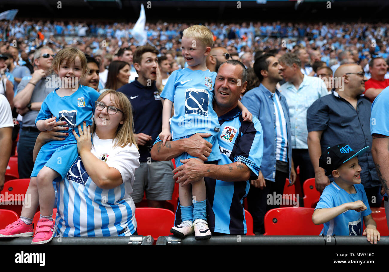 Coventry City fans in the stands show their support Stock Photo - Alamy