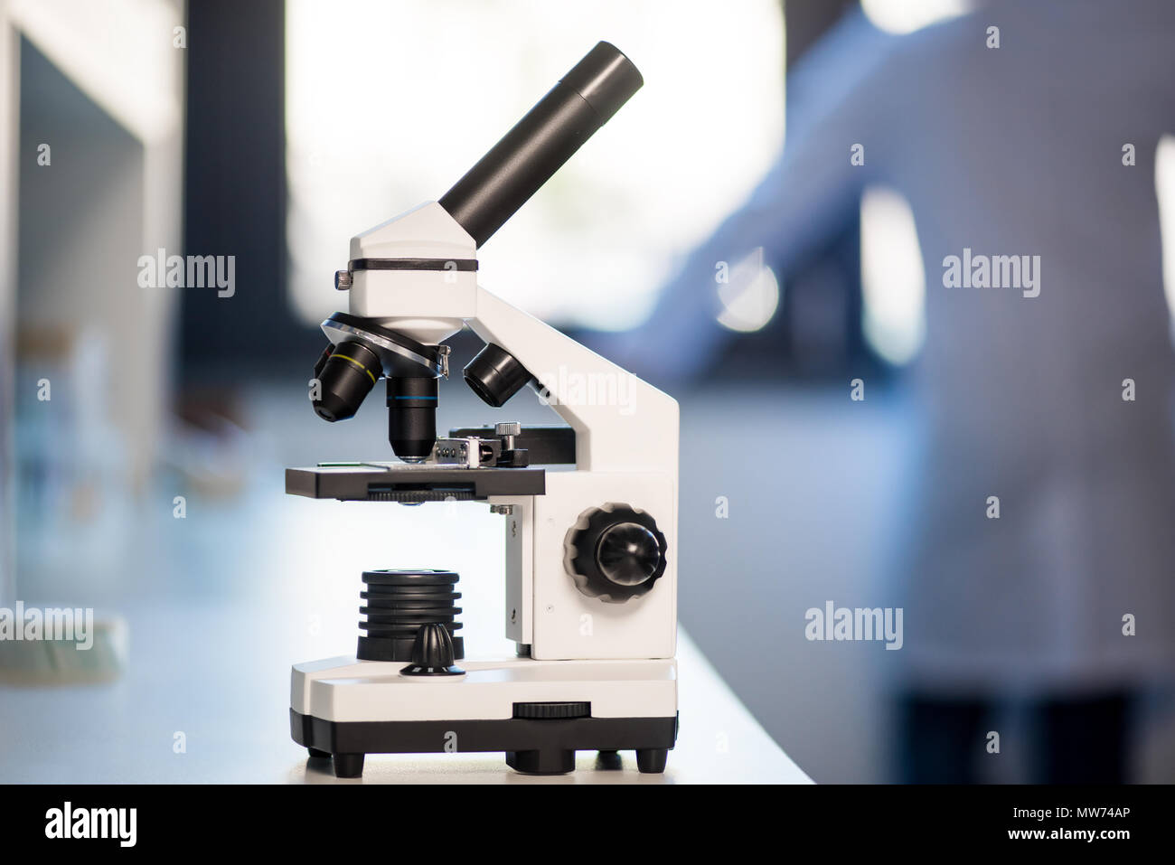 A microscope placed on table in laboratory Stock Photo - Alamy
