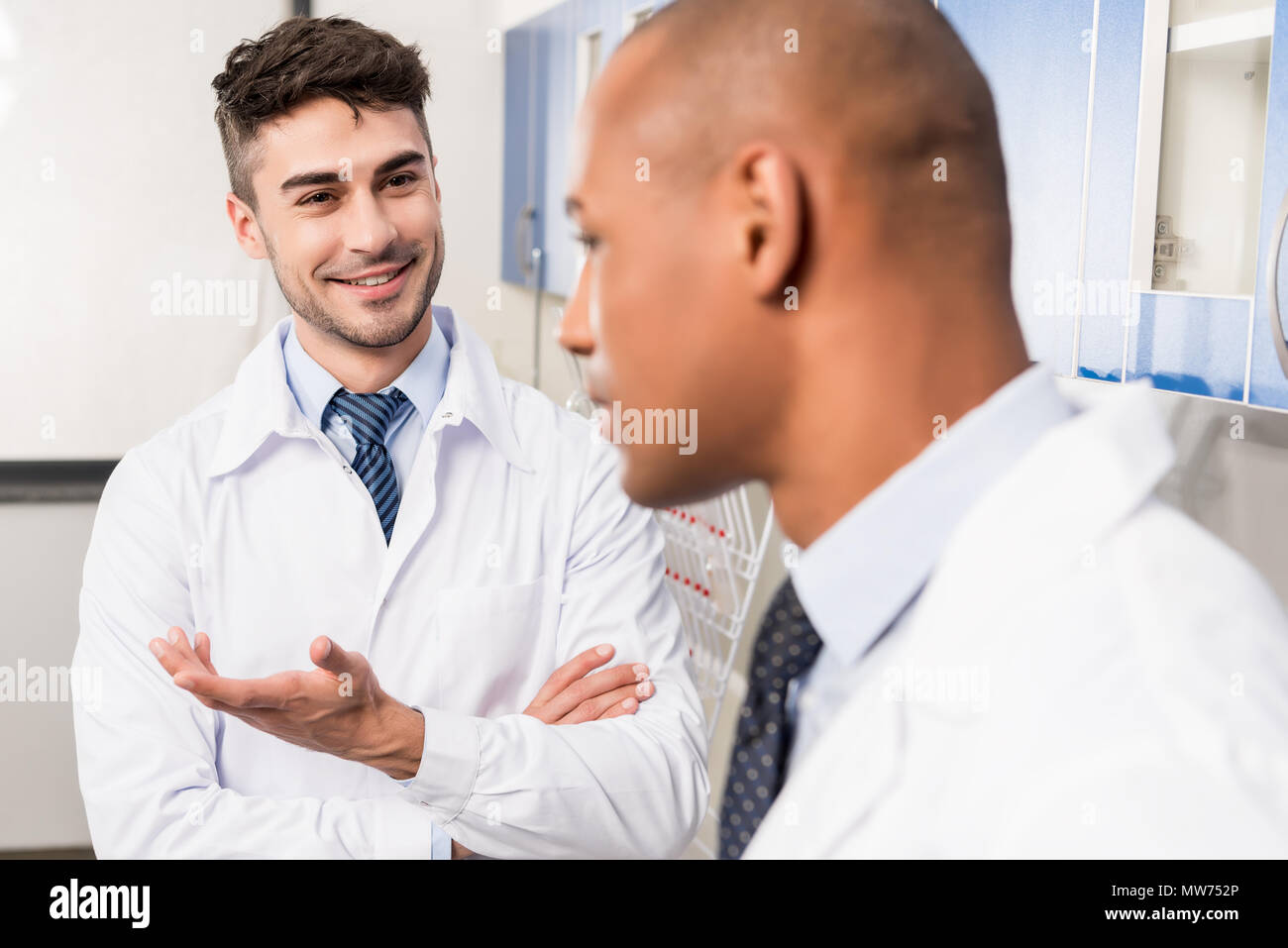 Two scientists talk in laboratory hi-res stock photography and images ...