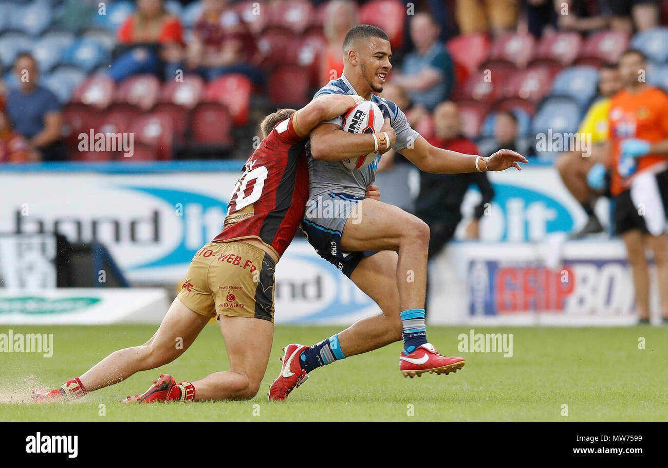 Huddersfield Giants' Darnell McIntosh (right) is tackled by Catalan ...