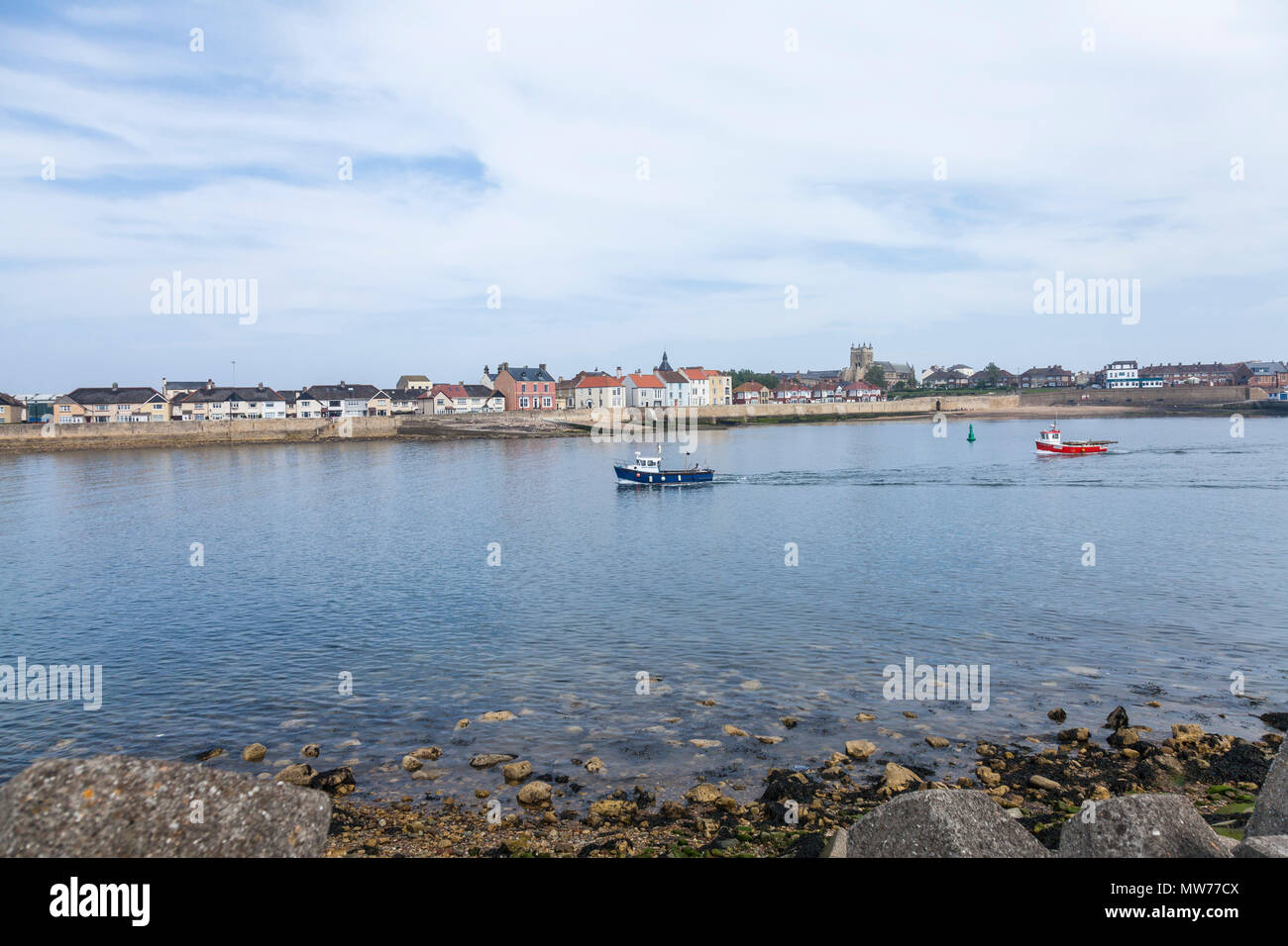 Two boats enter the harbour area at the Headland at Old Hartlepool ...