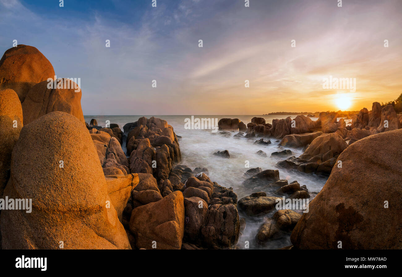 Rock beach beautiful sunrise spot in Mui Ne, Vietnam Stock Photo - Alamy