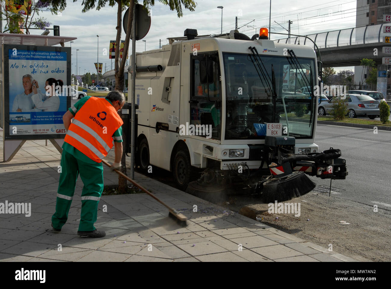 A road sweeper with his City Council street cleaning vehicle on the ...