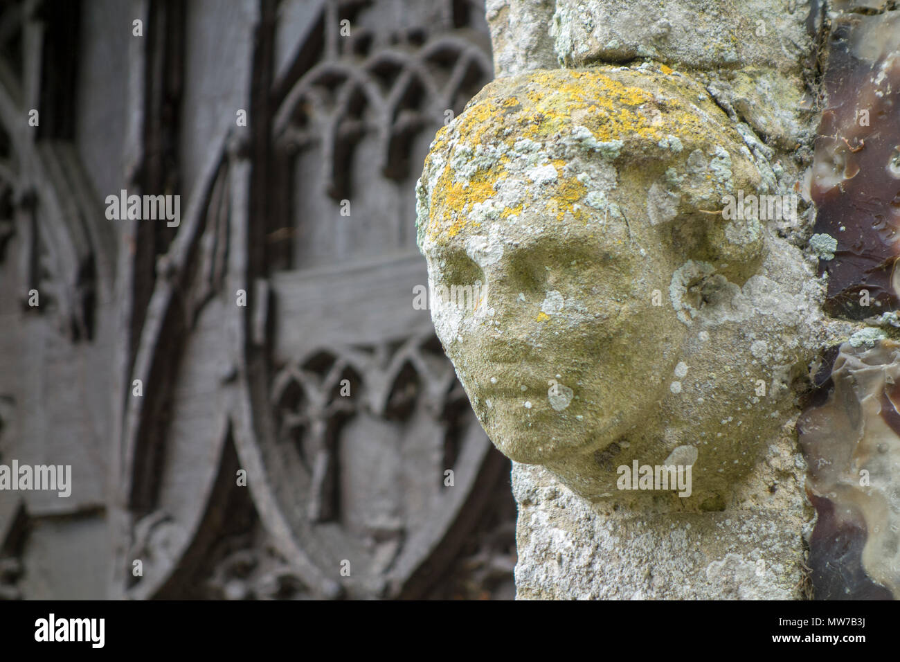 Coltishall Church stone carved head Stock Photo - Alamy