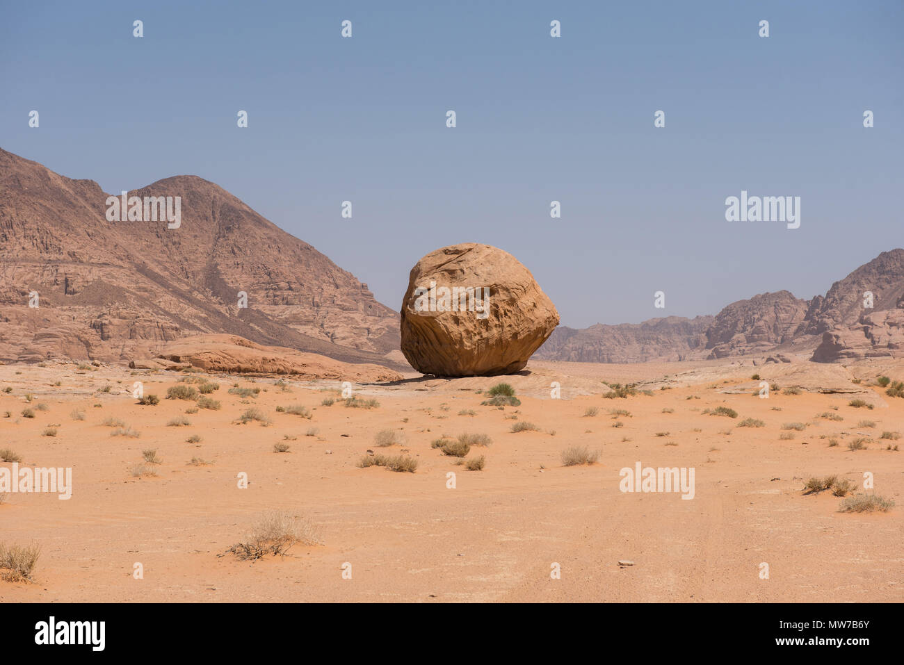 Round rock, boulder in the desert. Wadi Rum, Jordan Stock Photo - Alamy