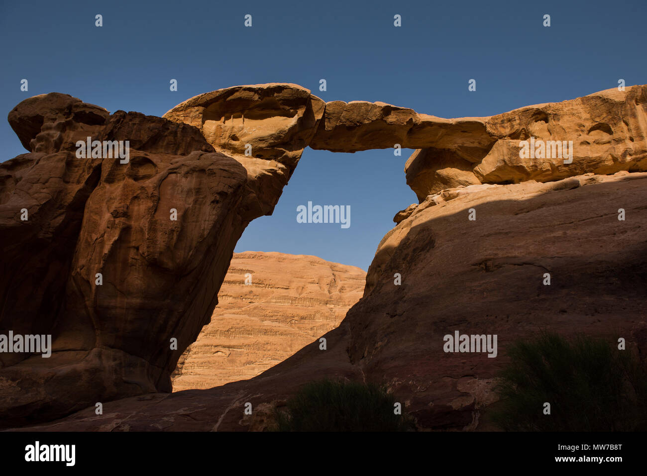 Um Frouth rock bridge in the desert, Wadi Rum, Jordan Stock Photo - Alamy