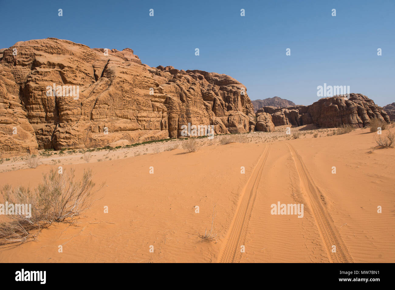 Wadi Rum desert, Jordan. Sandstone cliffs and sand dunes in the desert ...