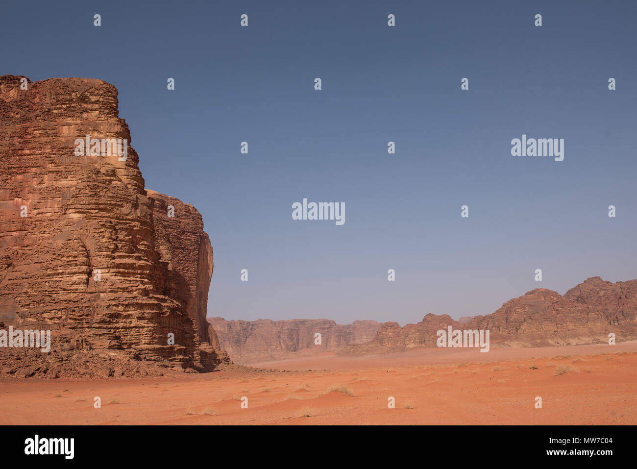 Wadi Rum desert, Jordan. Sandstone cliffs and sand dunes in the desert ...