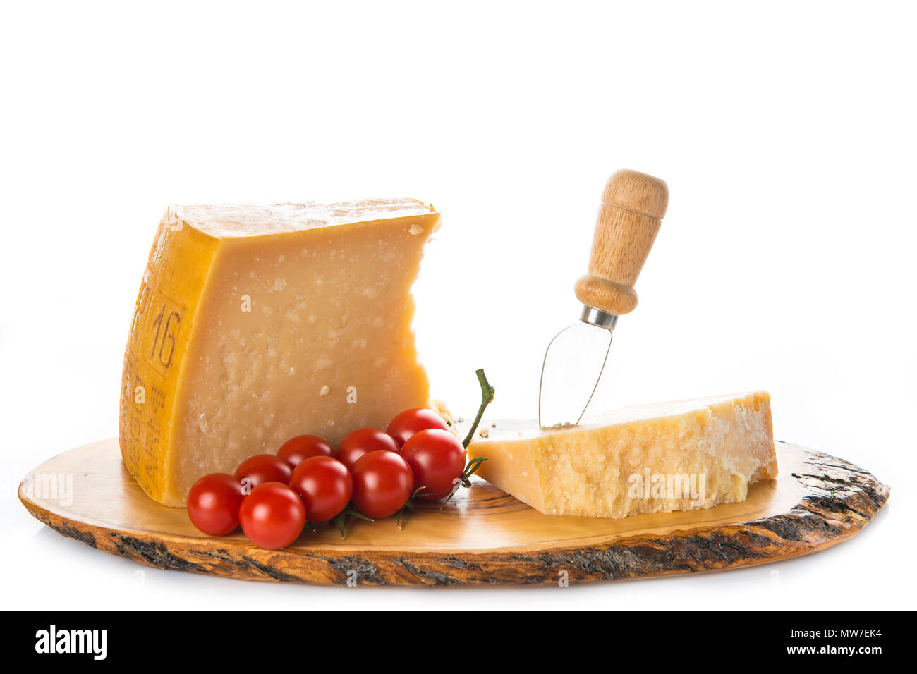 Parmesan cheese or parmigiano reggiano with cherry tomatoes and basil ...