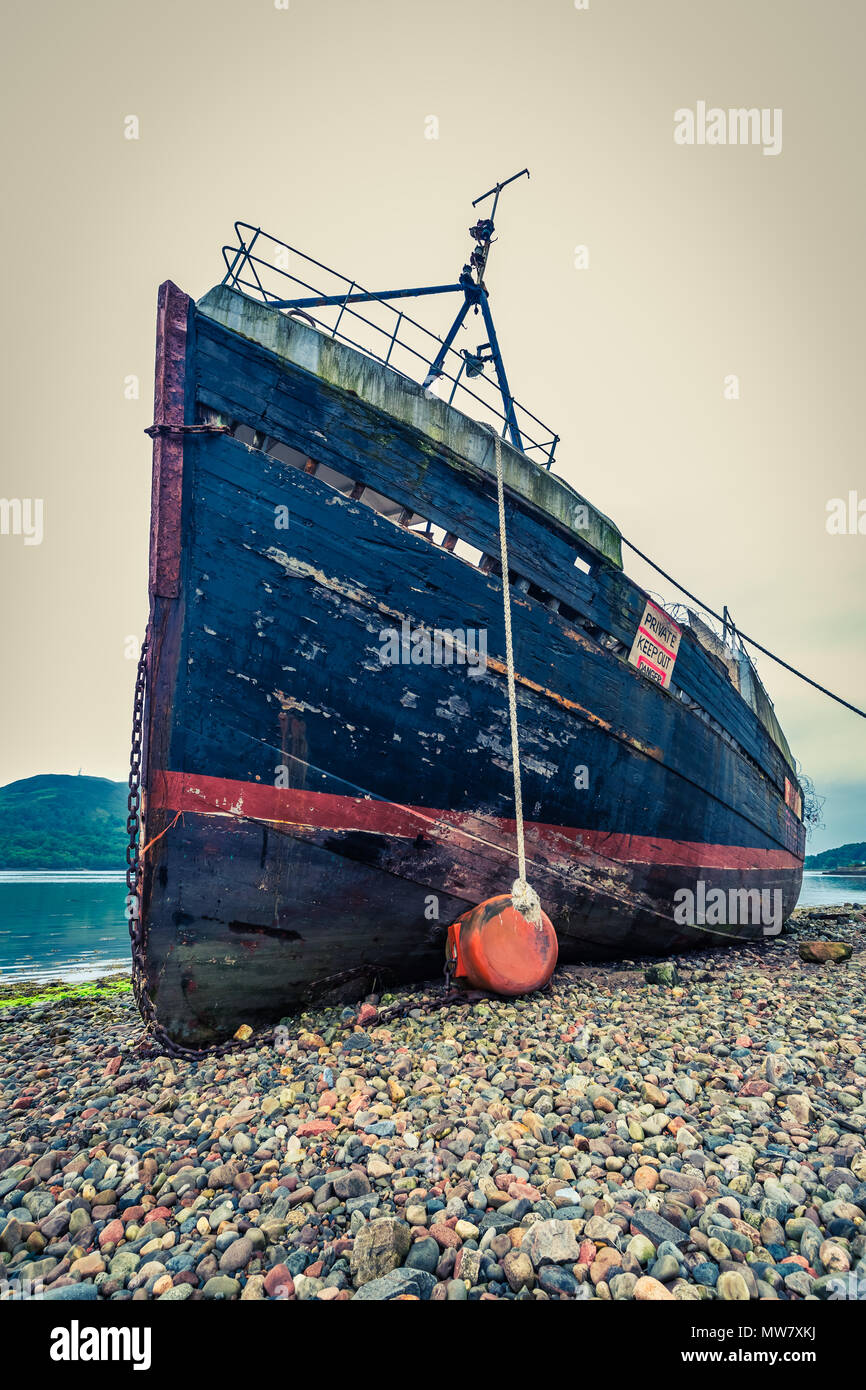 Rusty ship wreck in Fort William on shore, Scotland Stock Photo - Alamy
