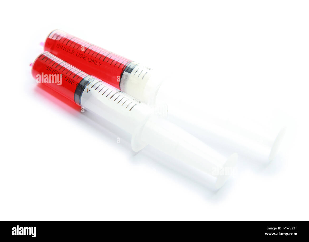 Syringe with red liquid isolated on white background Stock Photo - Alamy