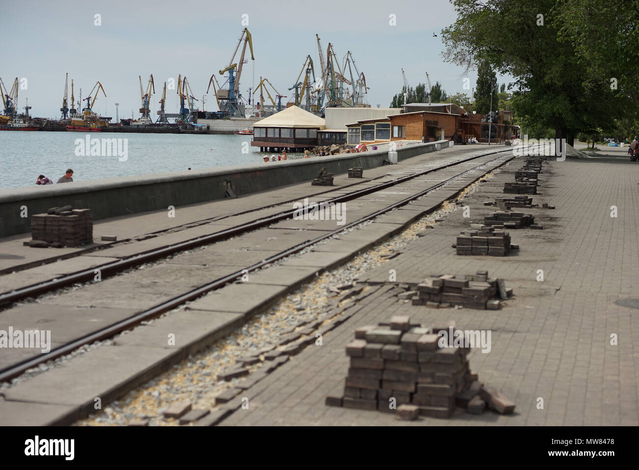 Replacement of paving slabs on the embankment of the city of Berdyansk ...