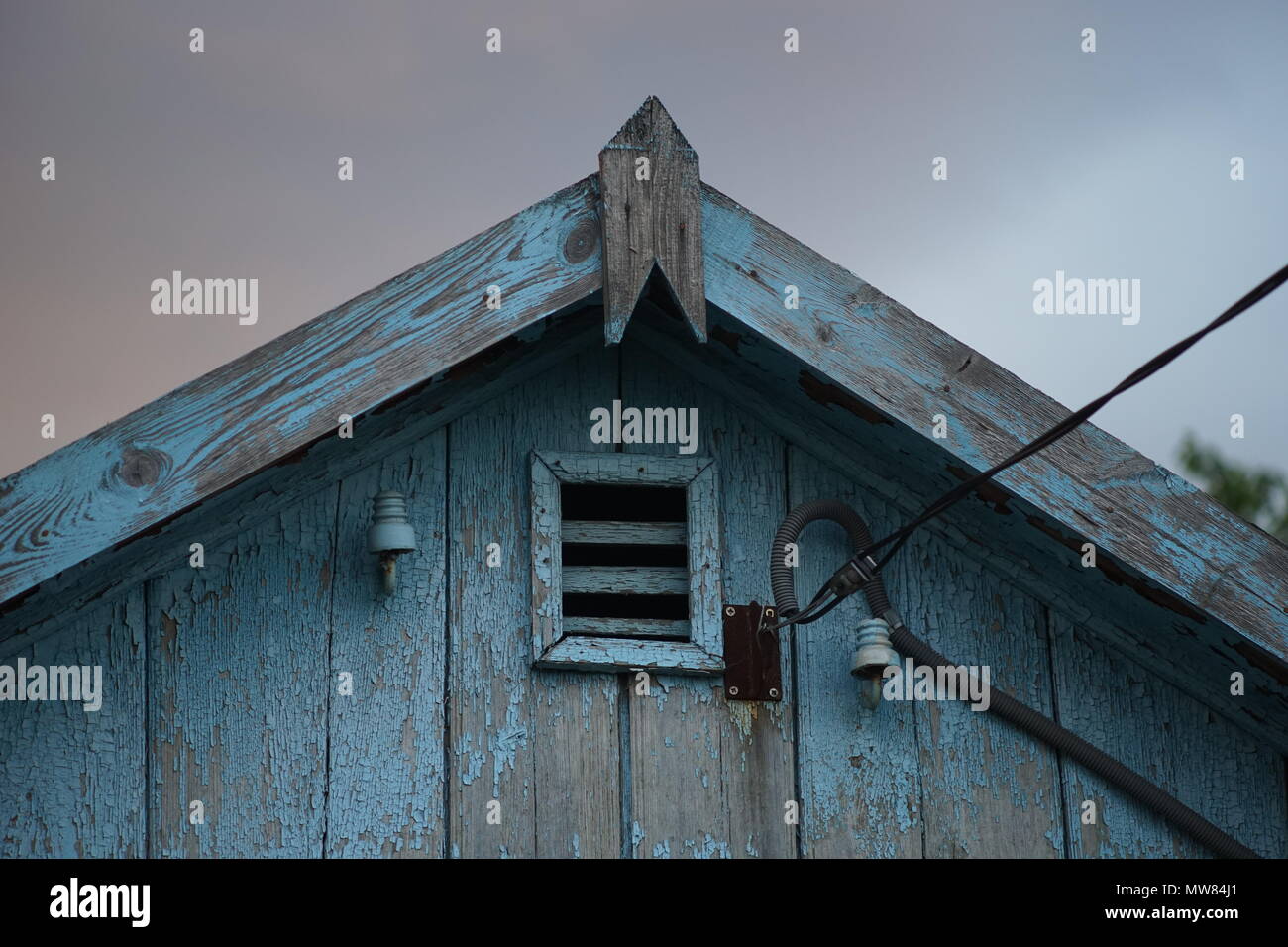 Part of the old roof with shabby blue paint Stock Photo - Alamy