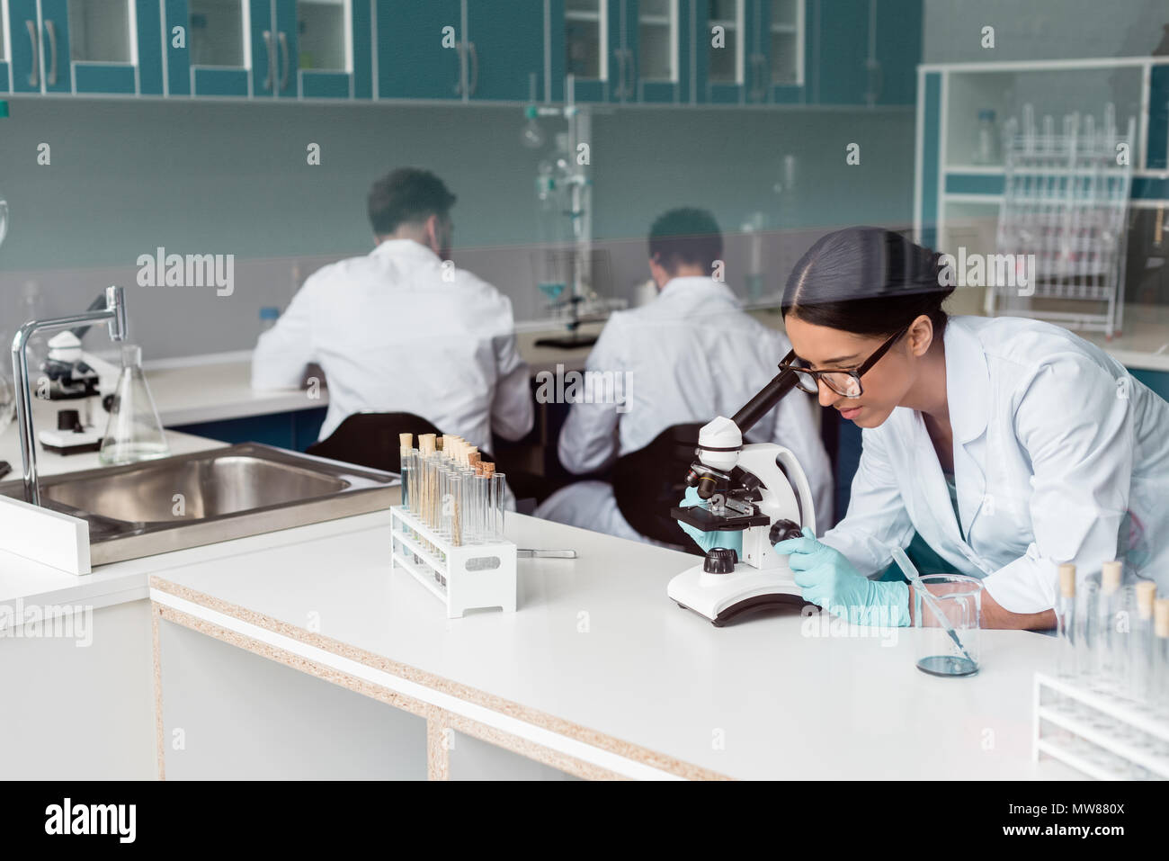 Scientists lab behind hi-res stock photography and images - Alamy