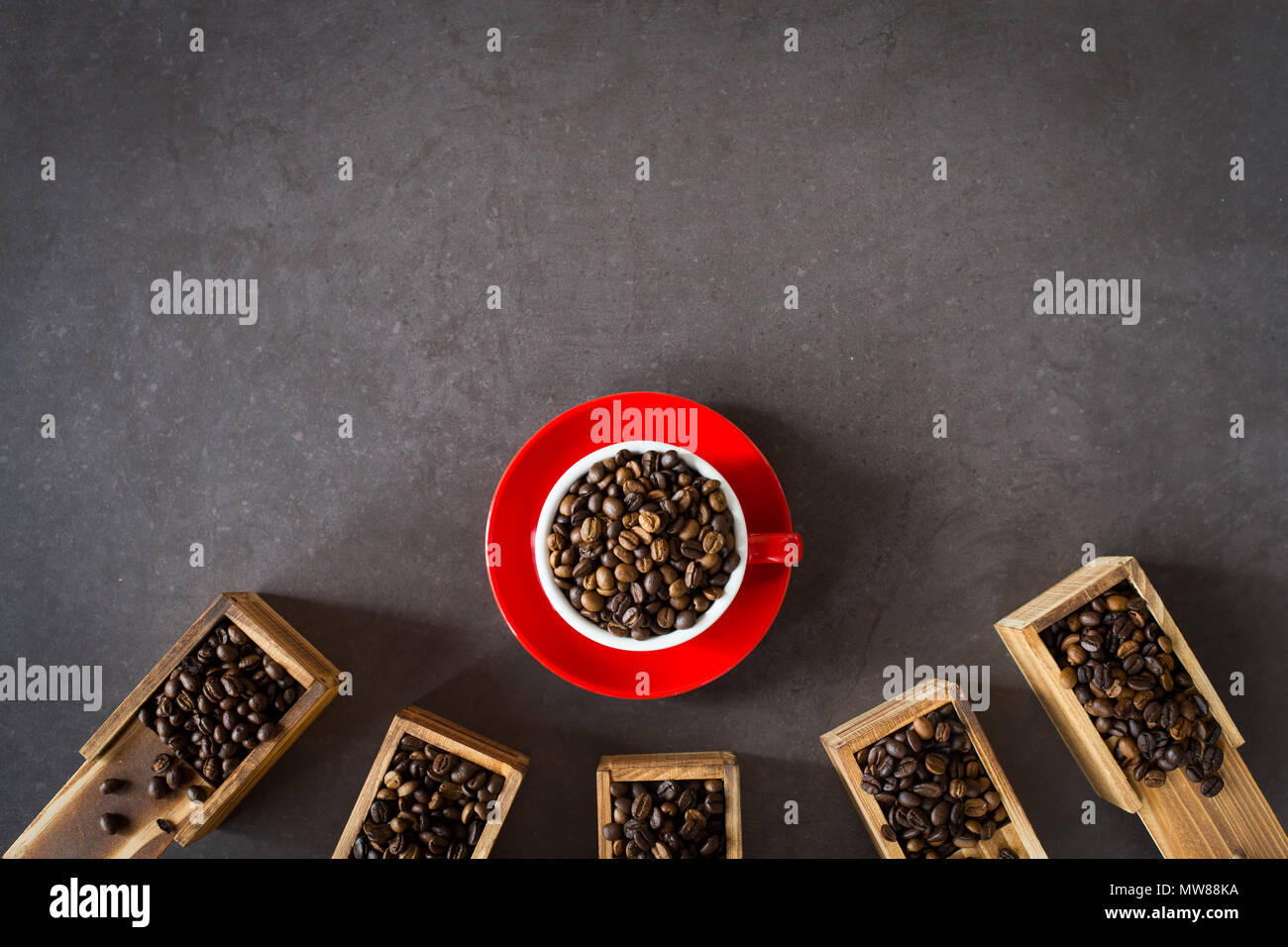 Cup of coffee beans and wood box coffee storage on old rusty background ...