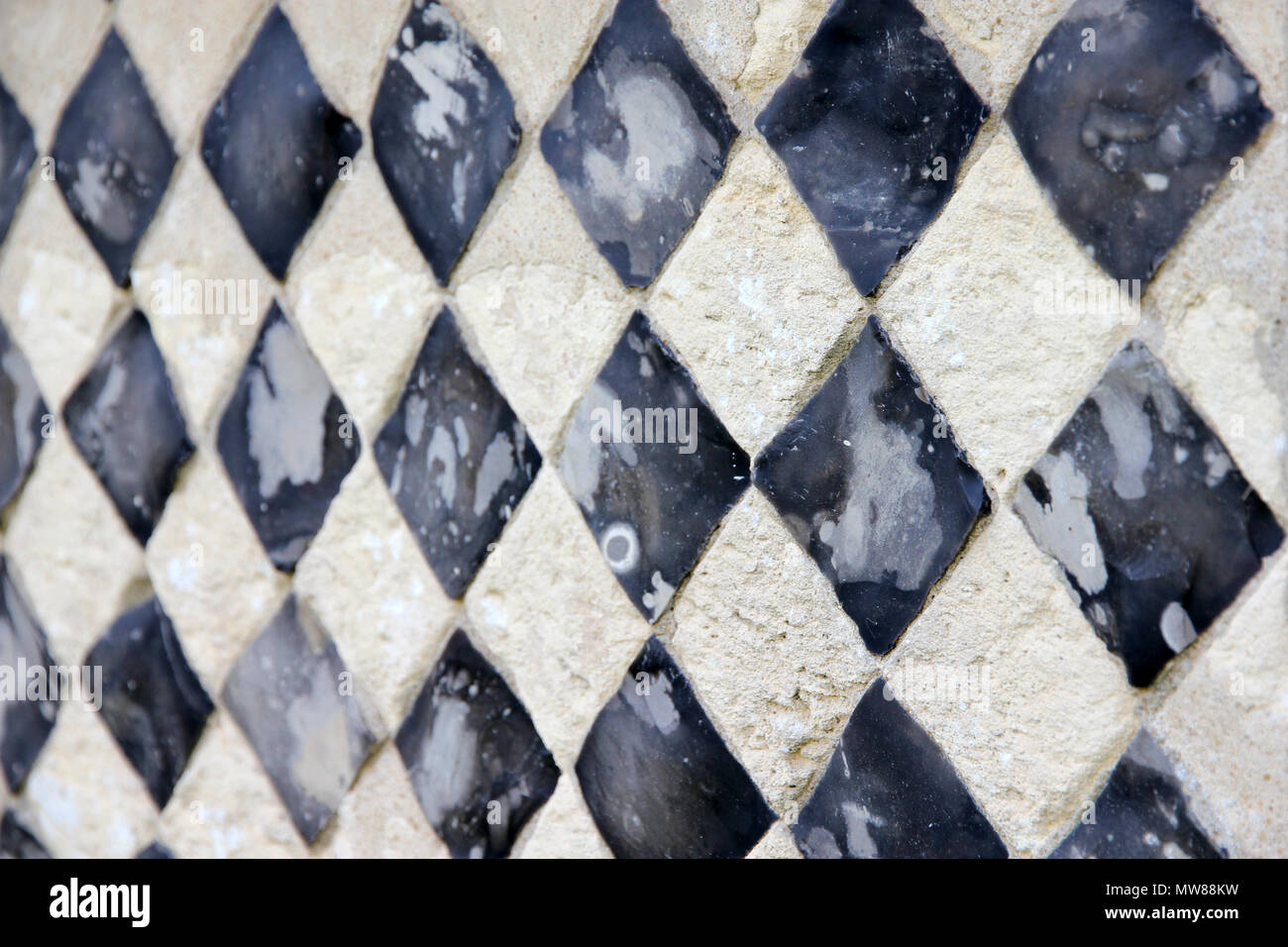 knapped flint wall St Andrews Church Walberswick Suffolk Stock Photo ...