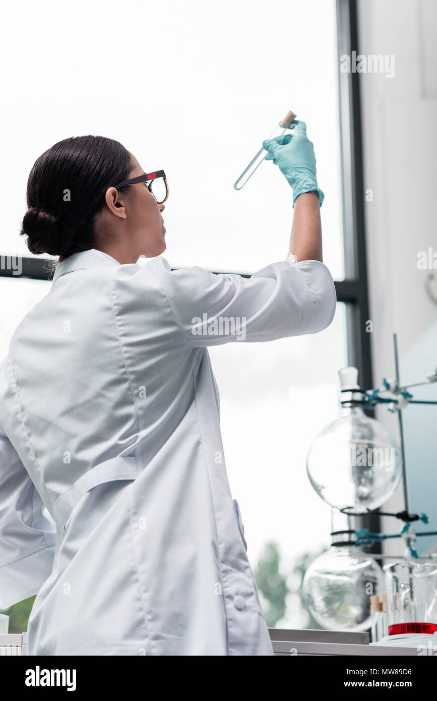 Scientist in eyeglasses white coat hi-res stock photography and images - Alamy
