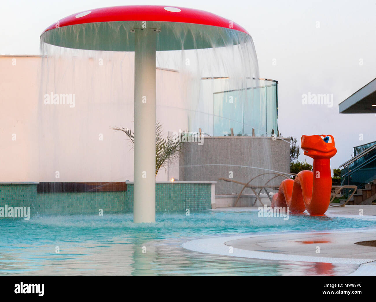 poll waterfall umbrella mushroom fountain running water Stock Photo - Alamy