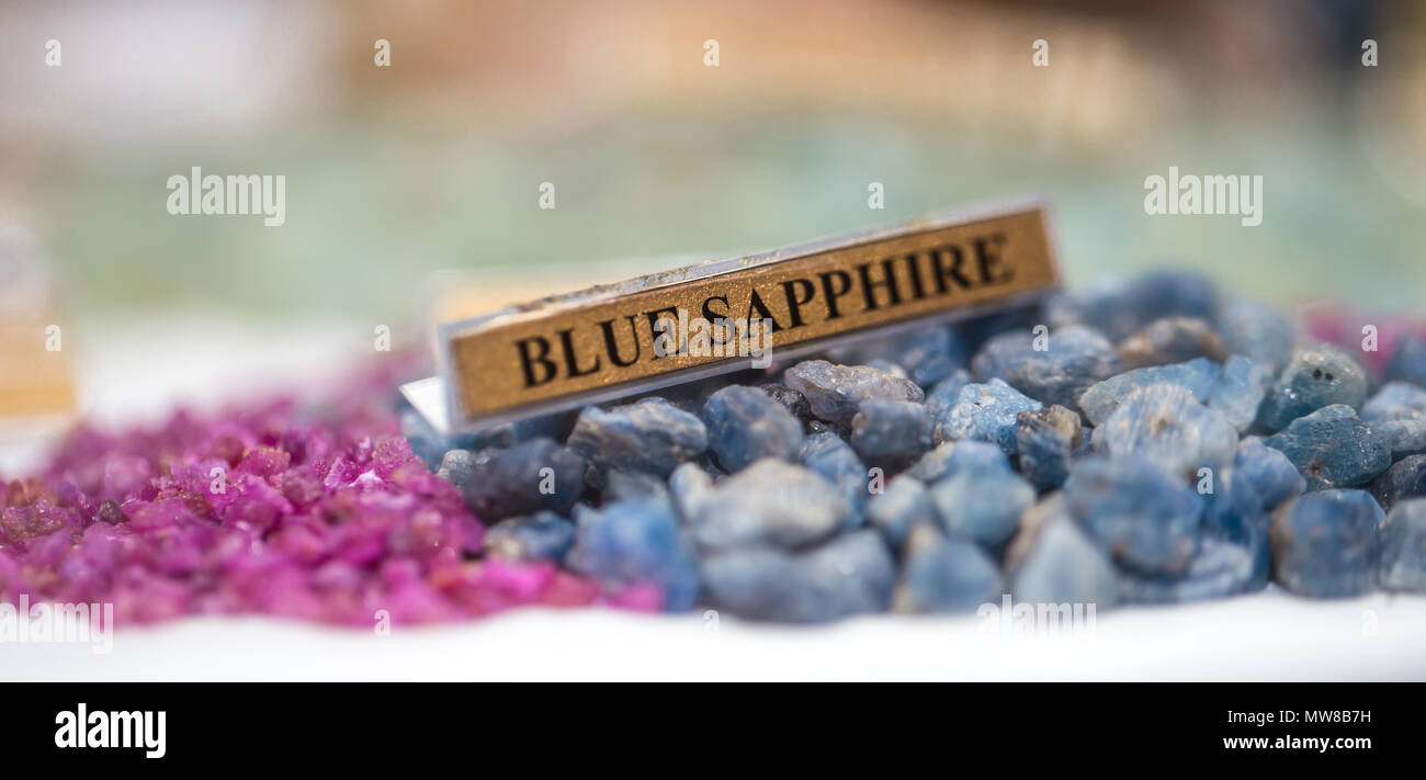 gems in the showcase of a shop close-up Stock Photo - Alamy